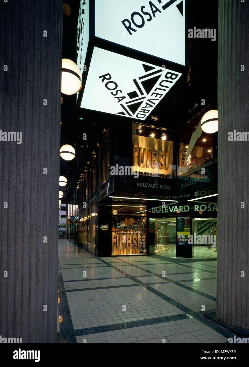 View of an illuminated commercial centre Stock Photo - Alamy