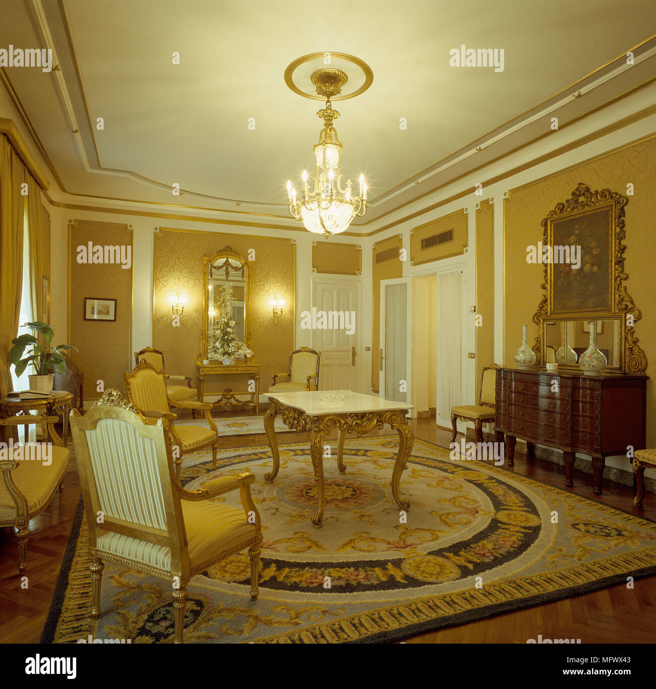 View of an illuminated living room Stock Photo - Alamy