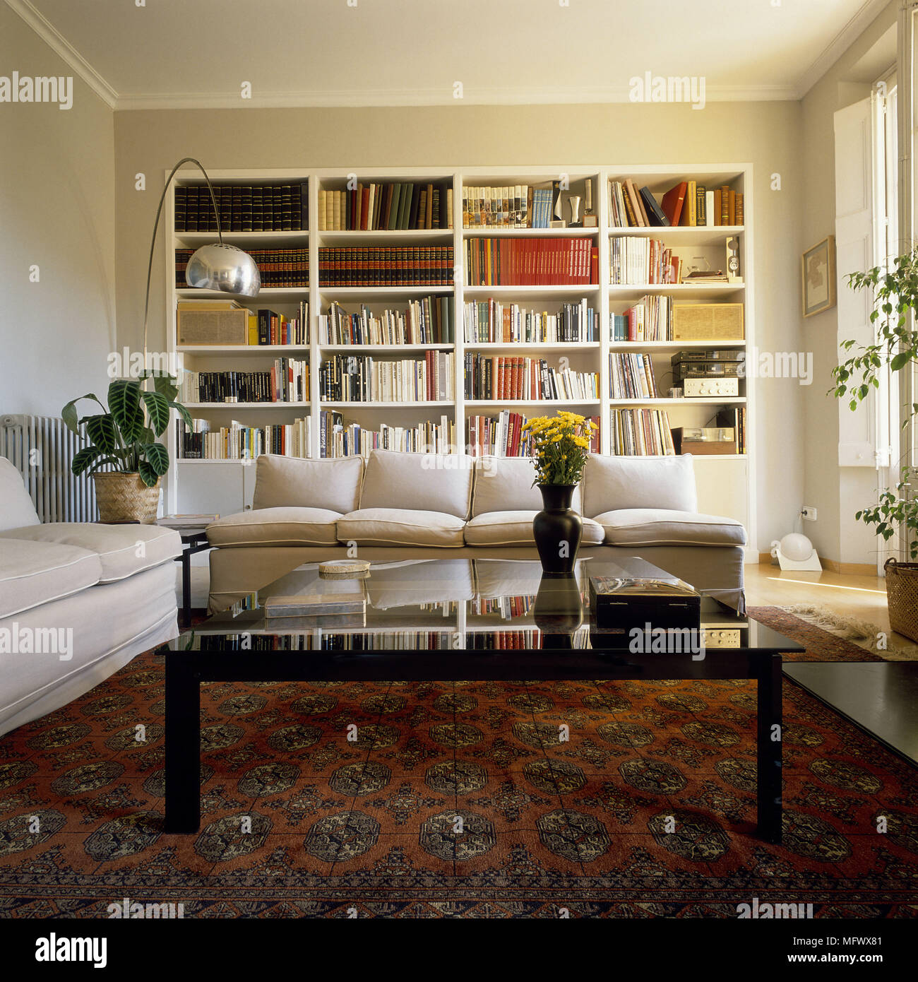 View of bookshelves in a room Stock Photo - Alamy