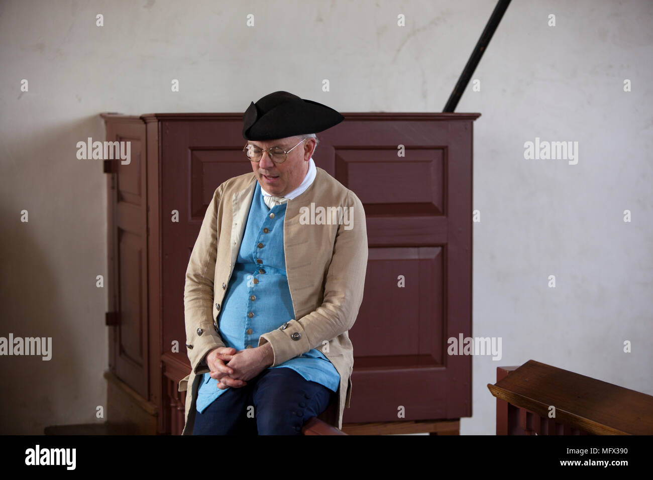 An actor in period early American costume speaking in the restored ...
