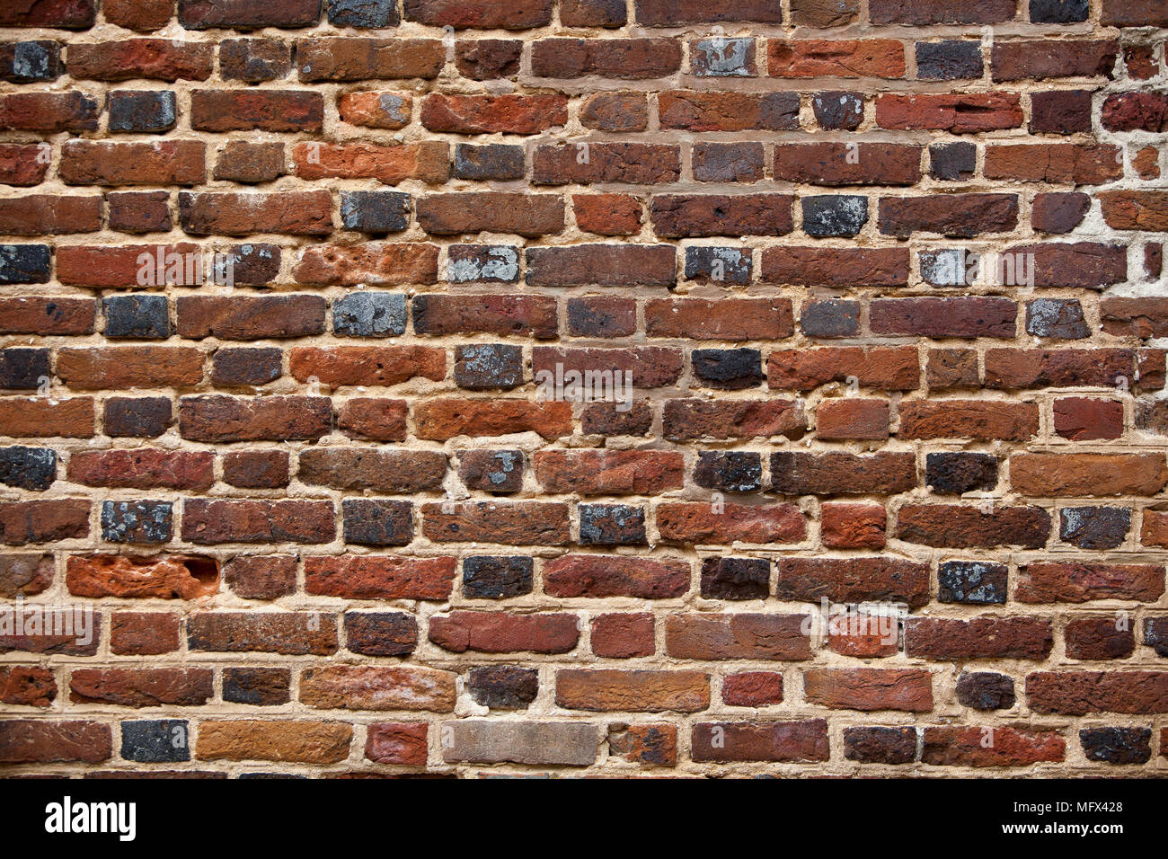 Antique early American handmade brick wall in Colonial Williamsburg ...