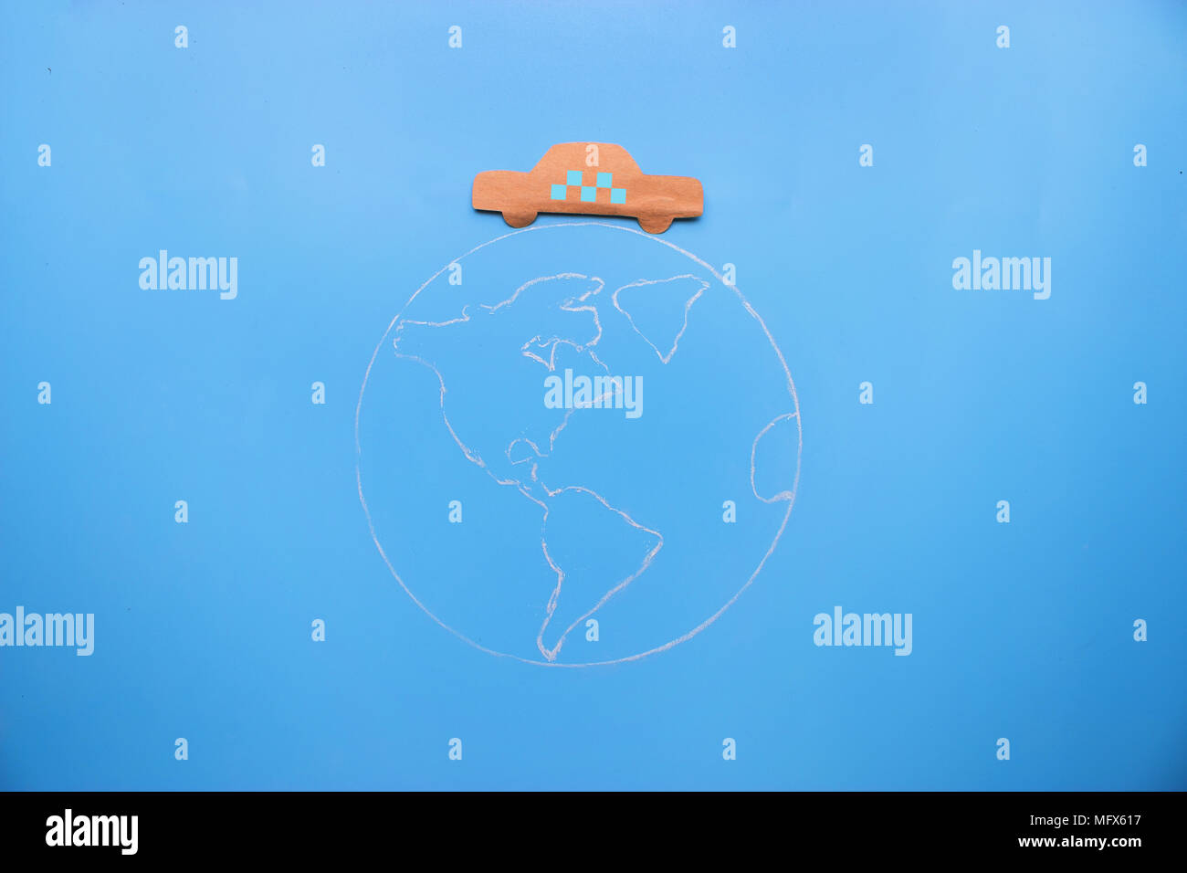paper taxi on the world map. taxi concept Stock Photo - Alamy