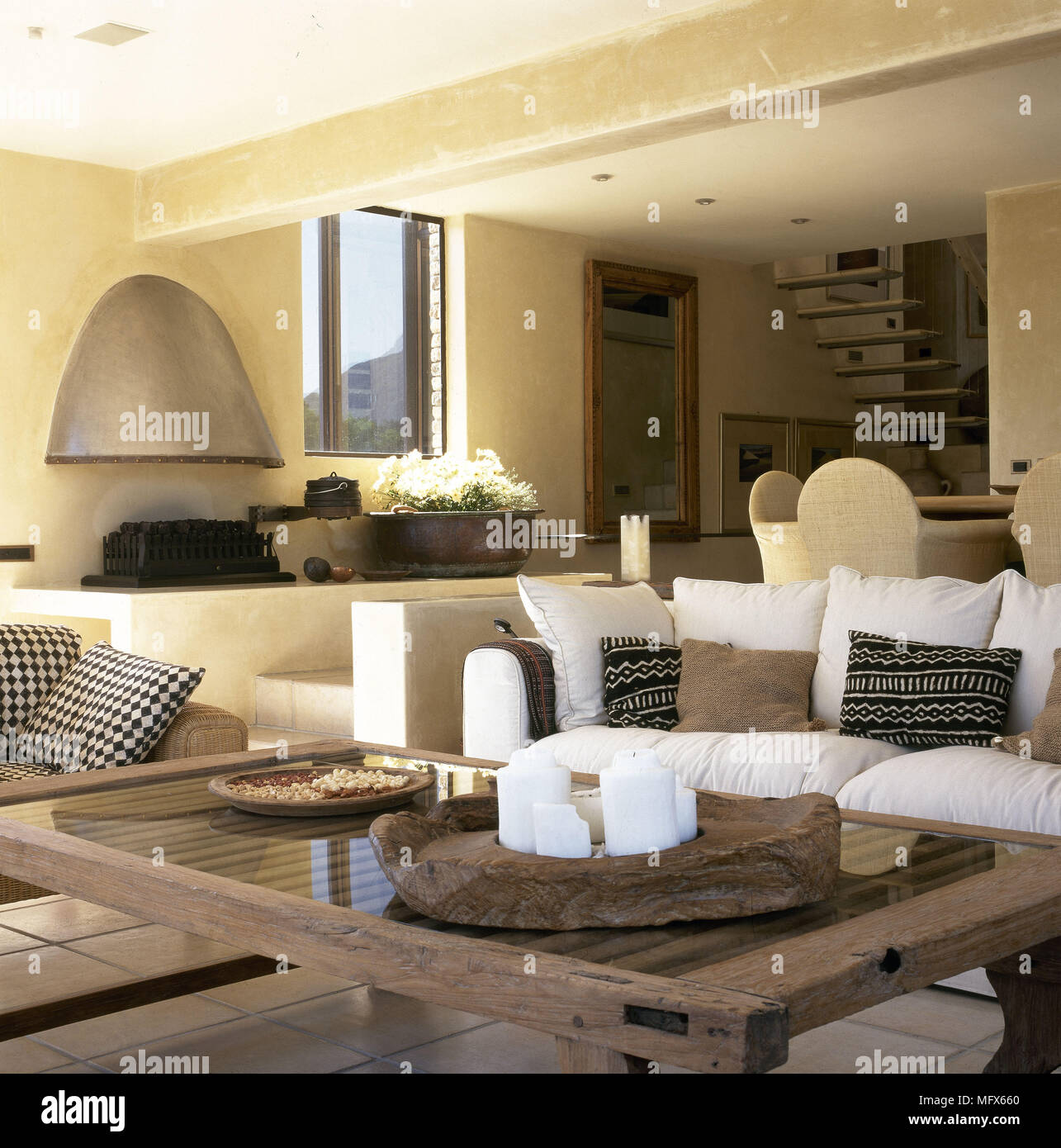 Open plan kitchen and dining area with wooden table and chairs Stock ...