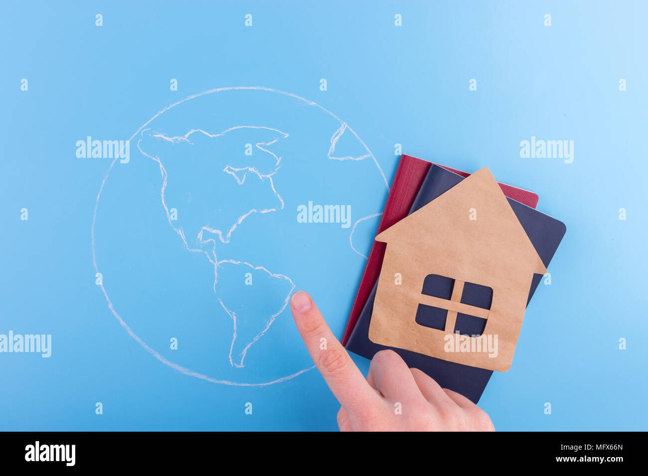 choose country to live concept. passports map house Stock Photo - Alamy