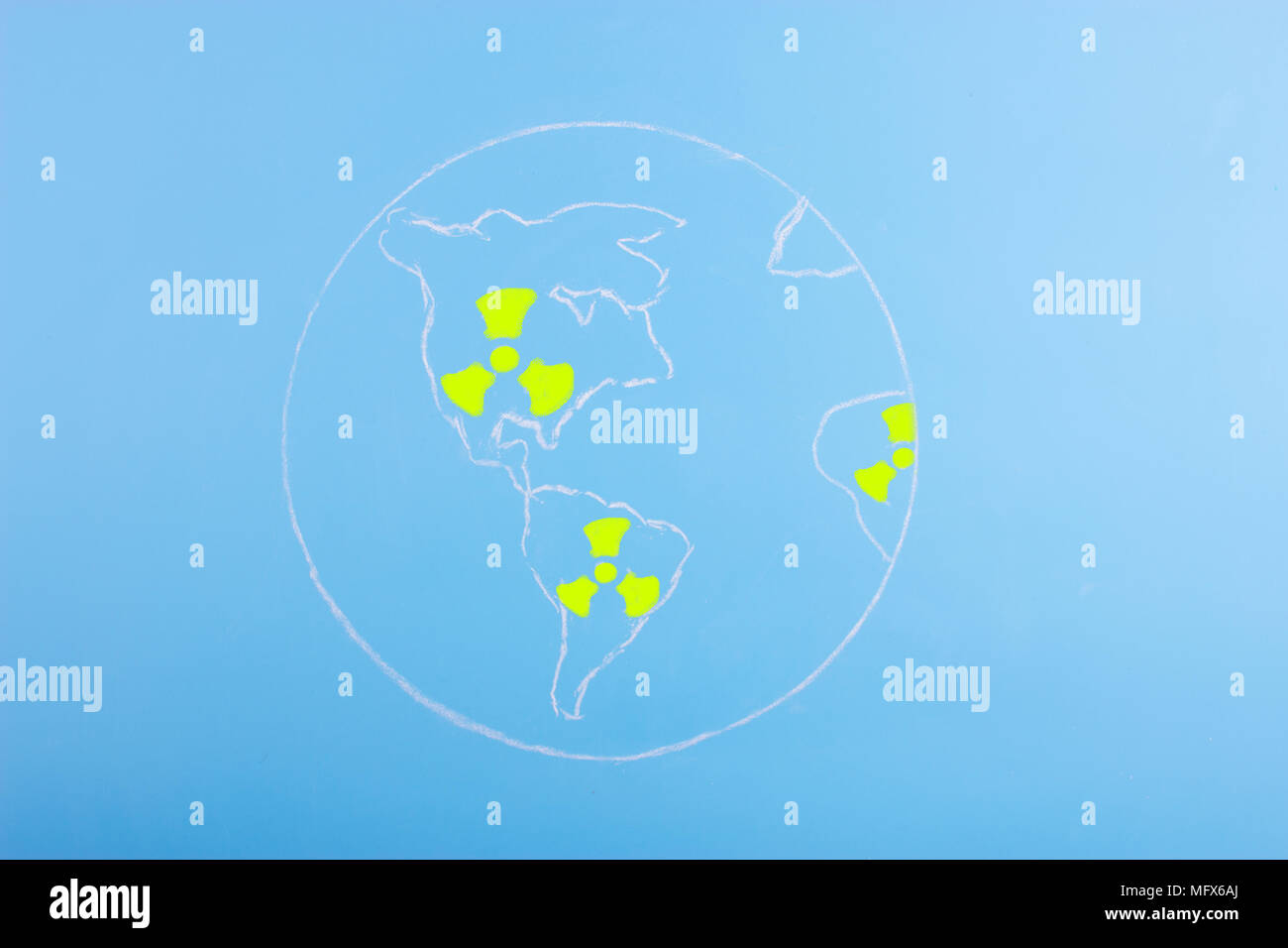 Radioactive radiation warning on the earth planet Stock Photo - Alamy