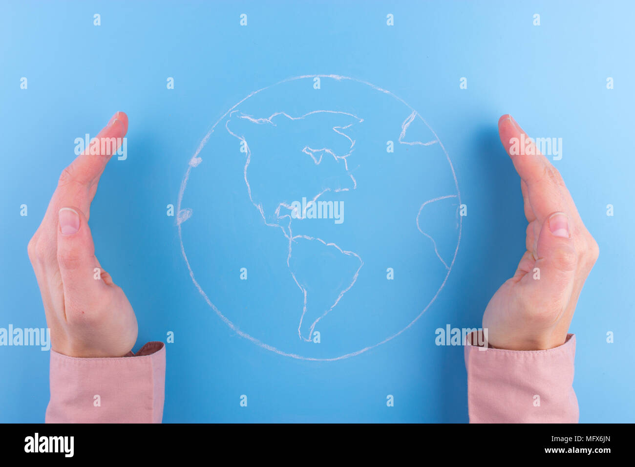 Woman hands holding earth. Save the earth concept Stock Photo - Alamy