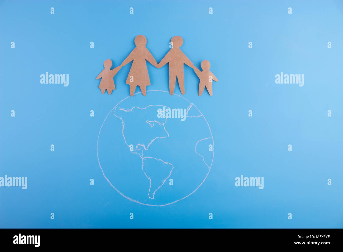 family made from paper stand on planet earth Stock Photo - Alamy