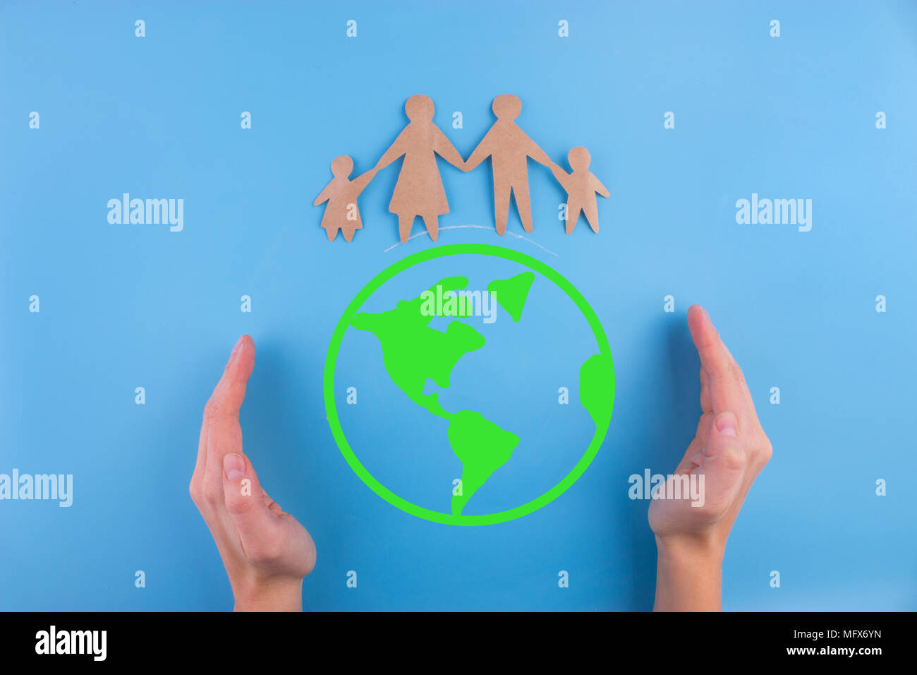 family made from paper stand on planet earth Stock Photo - Alamy