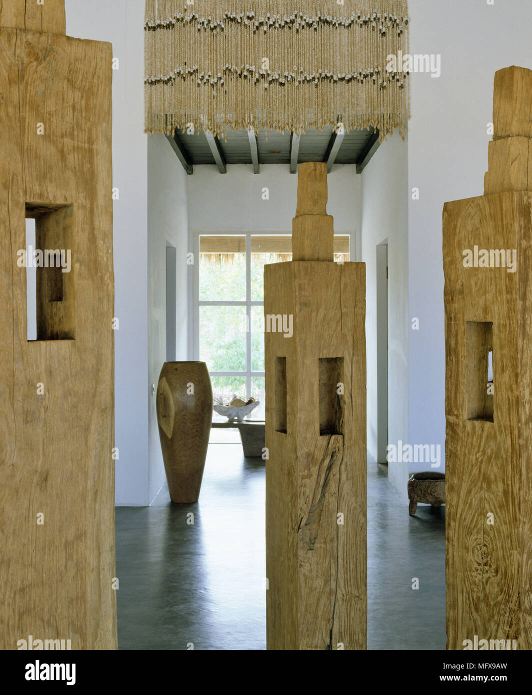 Three rustic wooden sculptures Stock Photo - Alamy