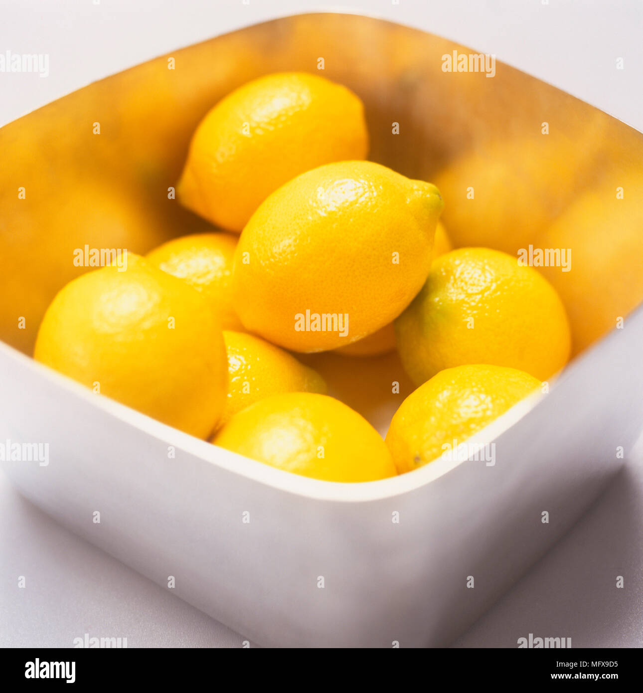 Fresh lemons in white box Stock Photo - Alamy