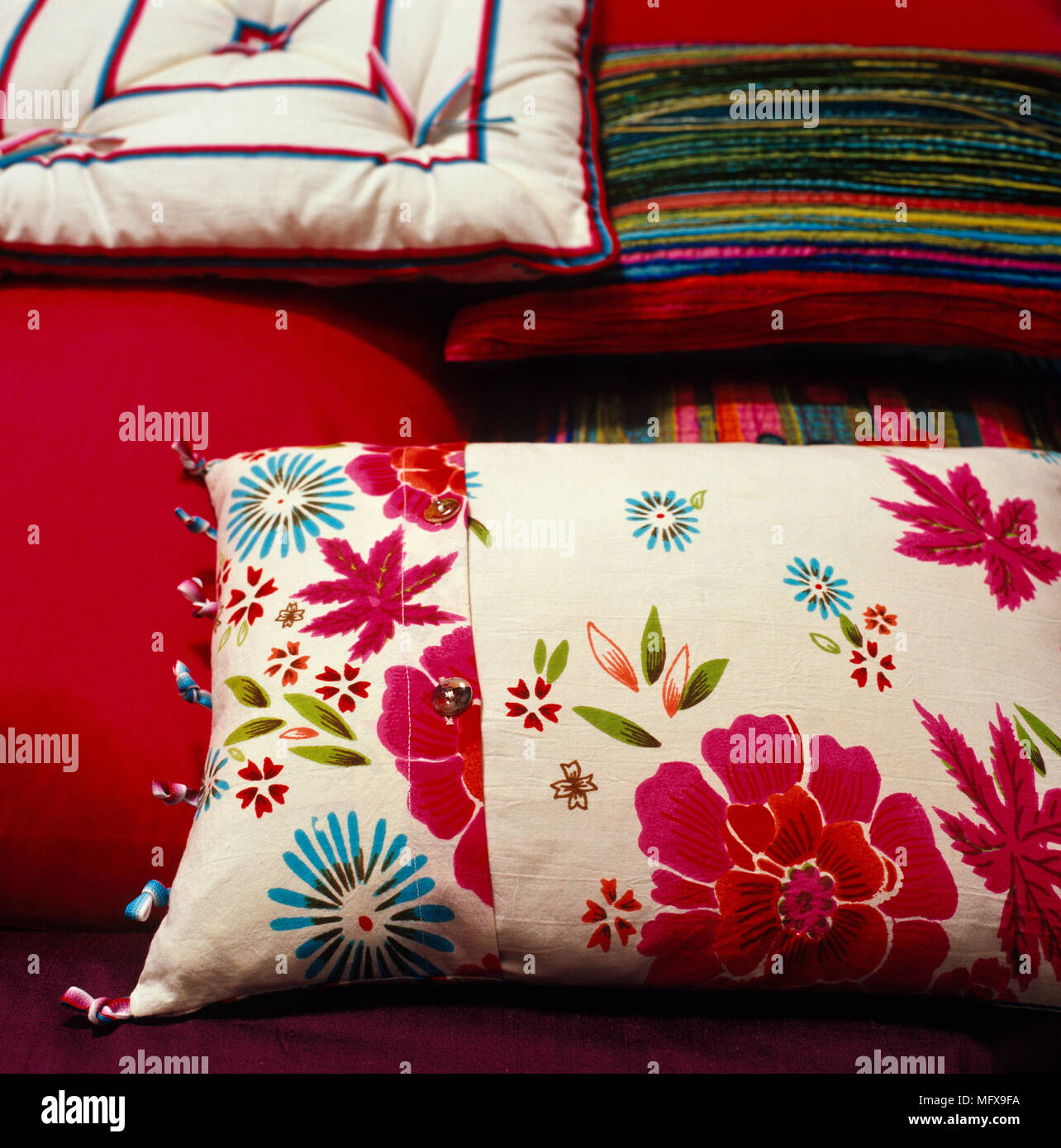Group of cushions with floral and stripe patterns Stock Photo - Alamy