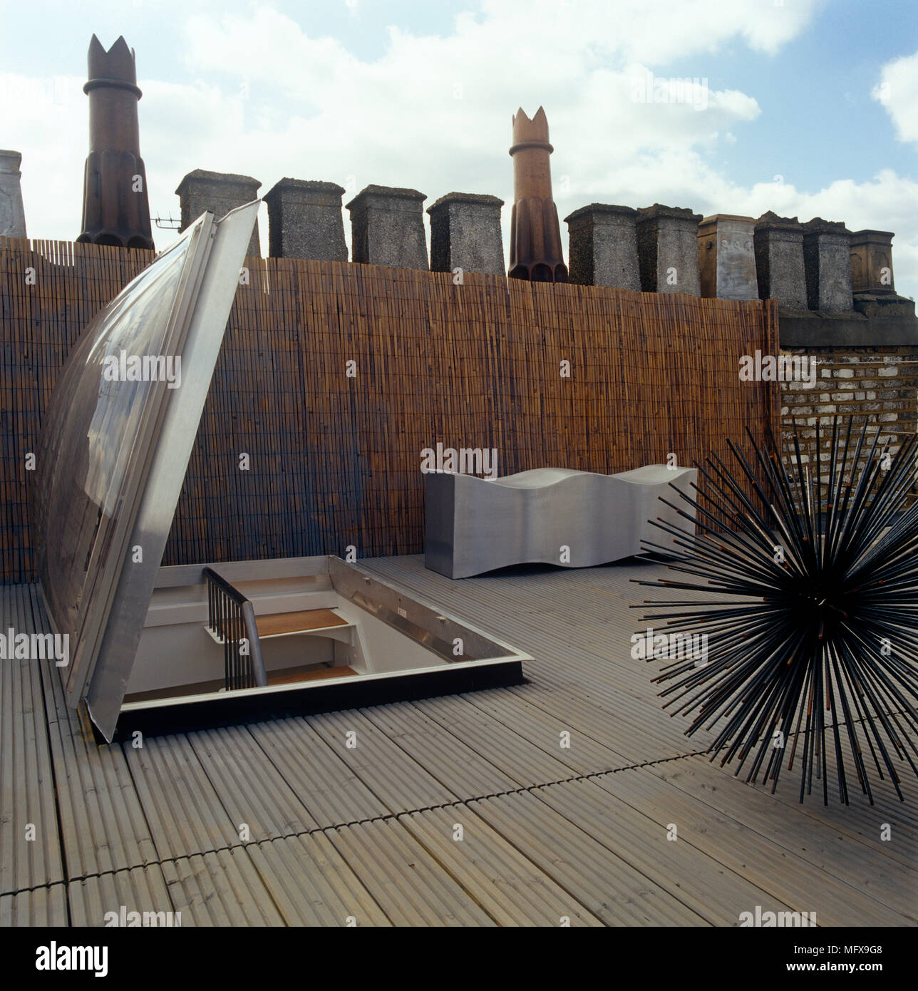 Roof garden with open skylight Stock Photo - Alamy