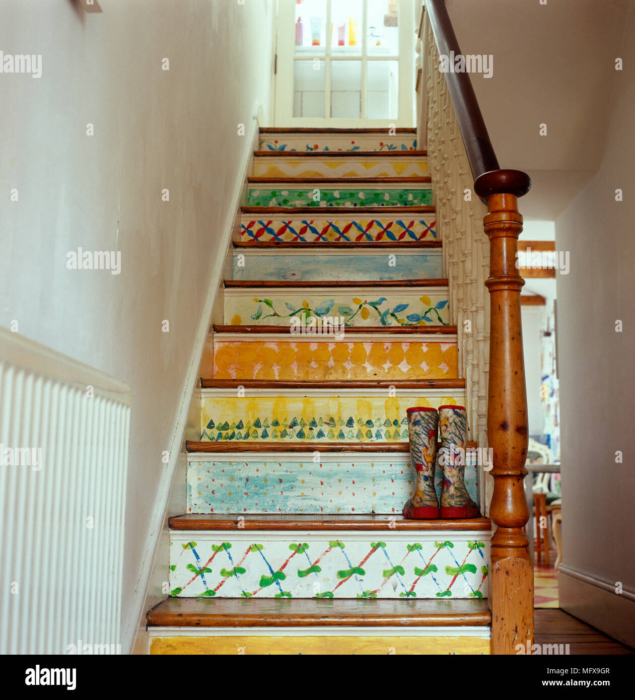 Staircase with brightly painted risers Stock Photo - Alamy
