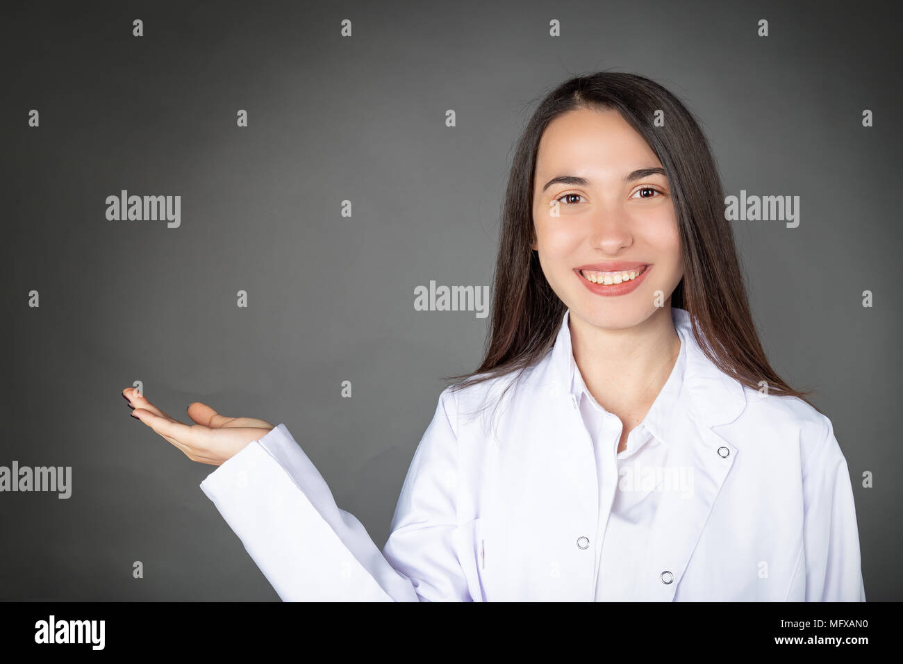 Turkish beautiful smiling young girl in doctor or chef clothes and ...