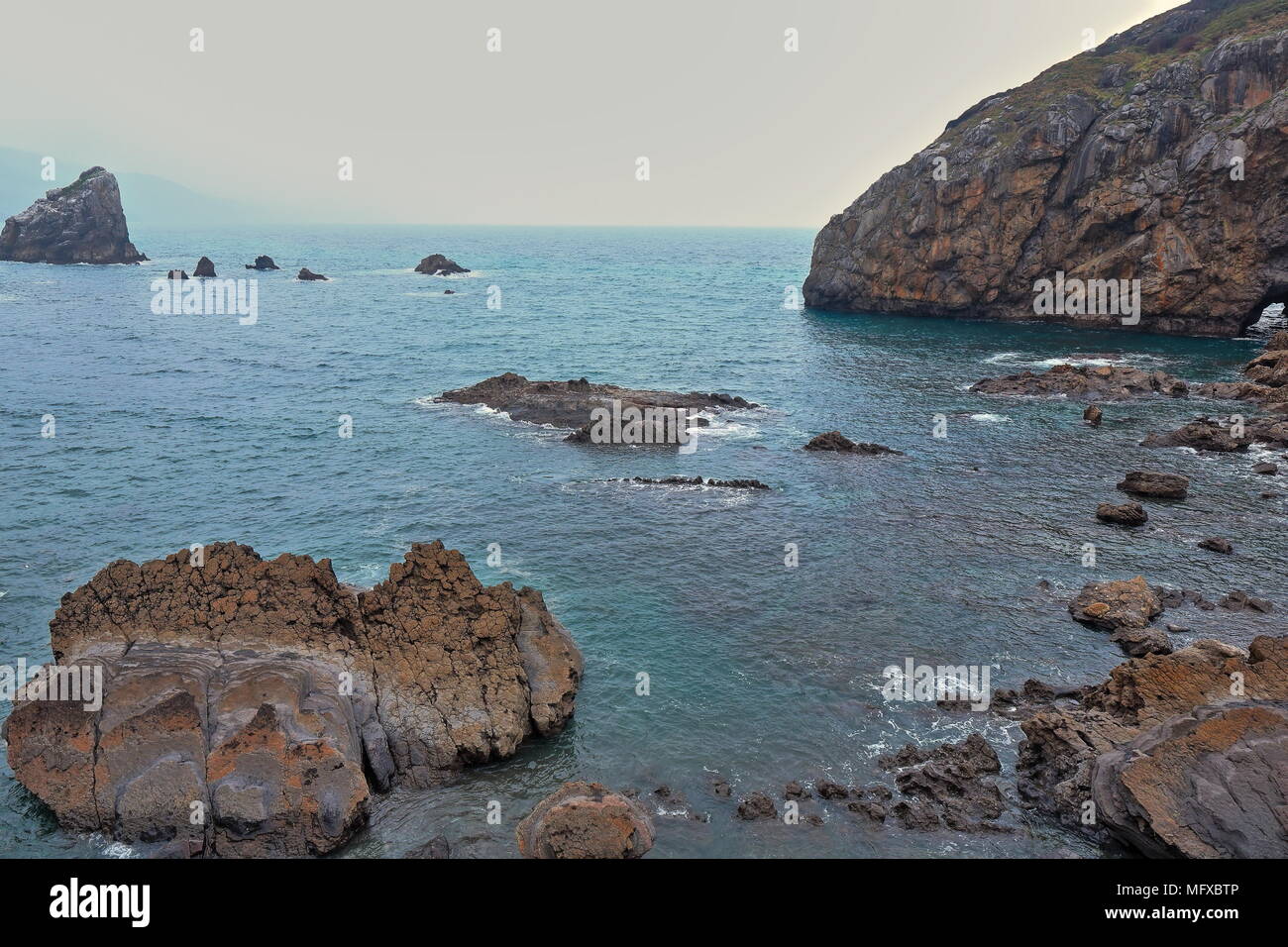 Rocks in a cove to the W.of Gaztelugatxe islet-San Juan hermitage on ...