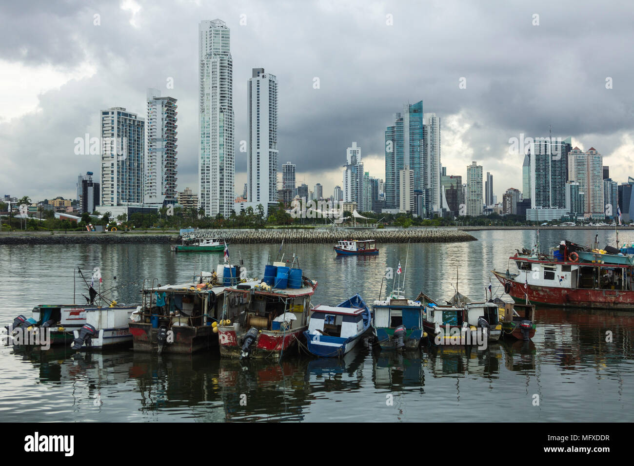 Colourful fishing boats anchored at the fish market in Panama City ...