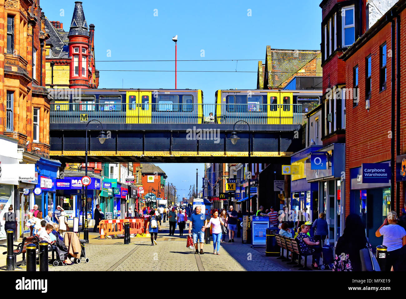 South Shields busy Ocean Road and Metro train and station Stock Photo ...