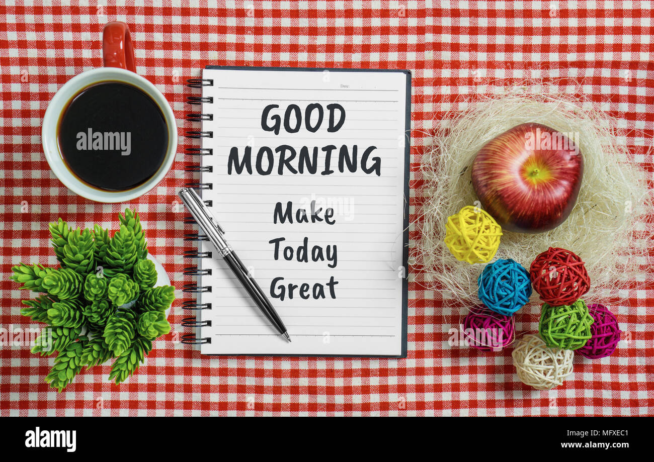 Good Morning. Make Today Great. Notebook with motivational quote on red ...