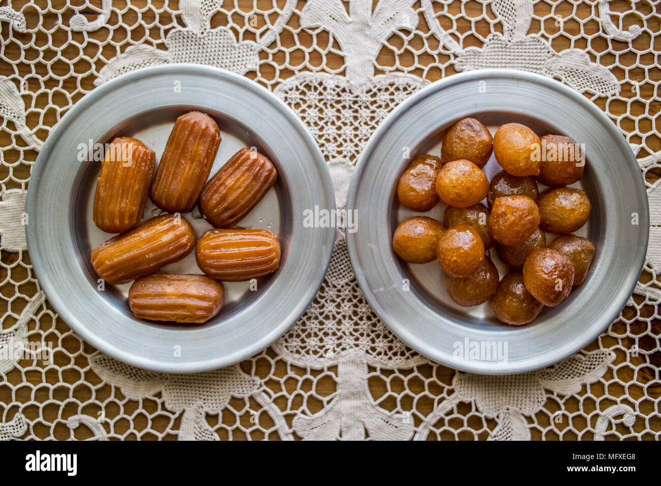 Turkish Traditional Lokma and Tulumba Dessert on a Rustic Tablecloth ...