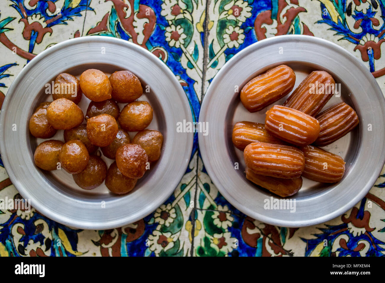 They are a fried batter soaked in syrup, similar to jalebis and churros ...