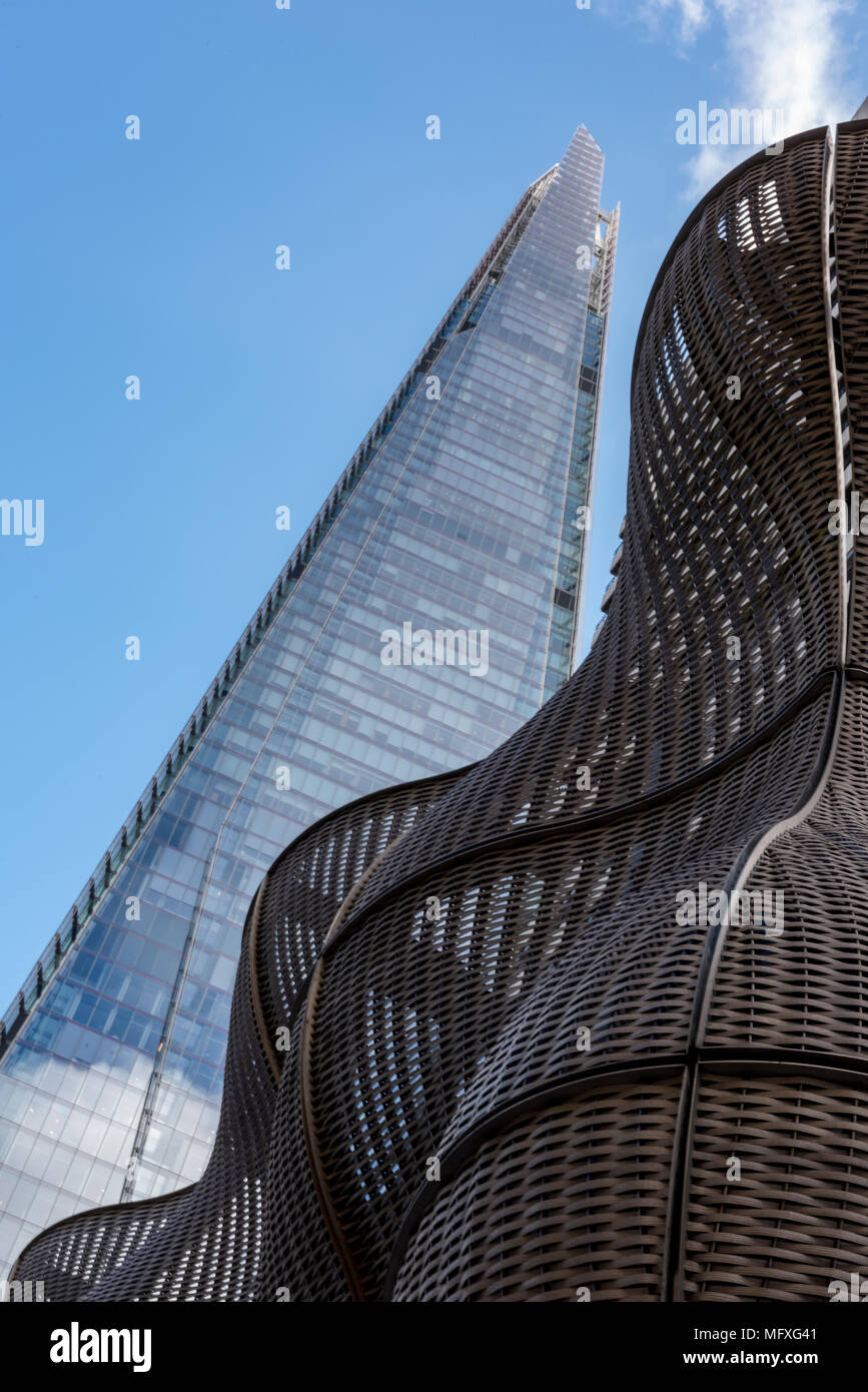 a different or unusual atmospheric view of the shard office building in ...