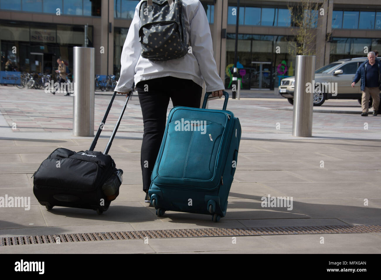 Suit case on wheels Stock Photo - Alamy