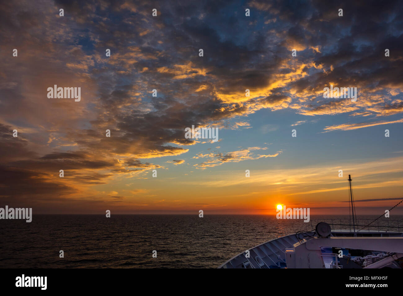 July Sunset Crossing the Arctic Circle Stock Photo - Alamy