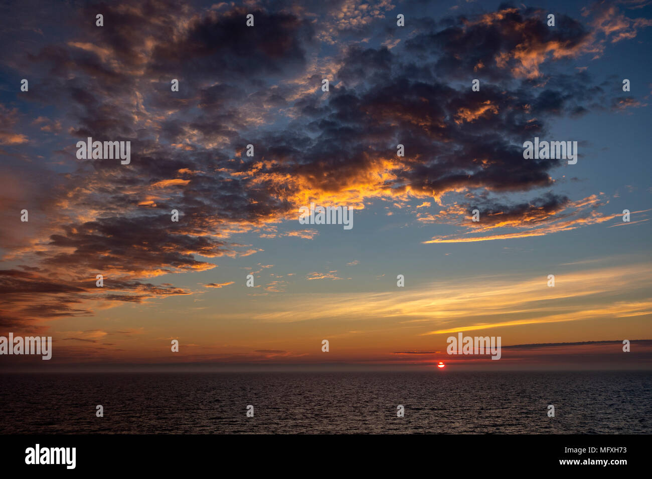 July Sunset Crossing the Arctic Circle Stock Photo - Alamy