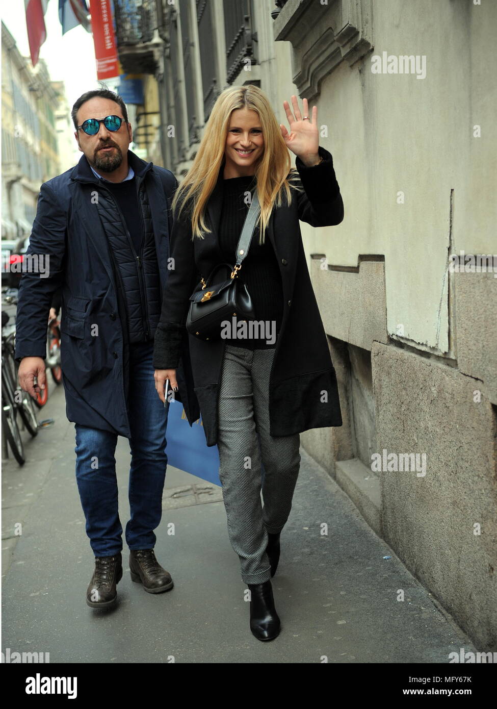 Michelle Hunziker shops at Banner in downtown Milan, Italy. Featuring ...
