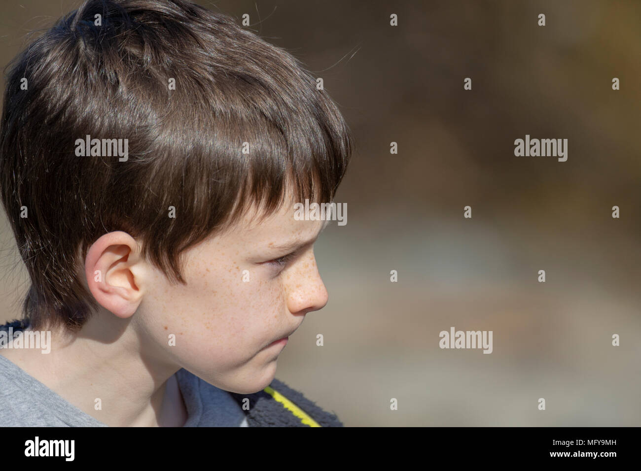 Boy gazing at something in the distance Stock Photo - Alamy