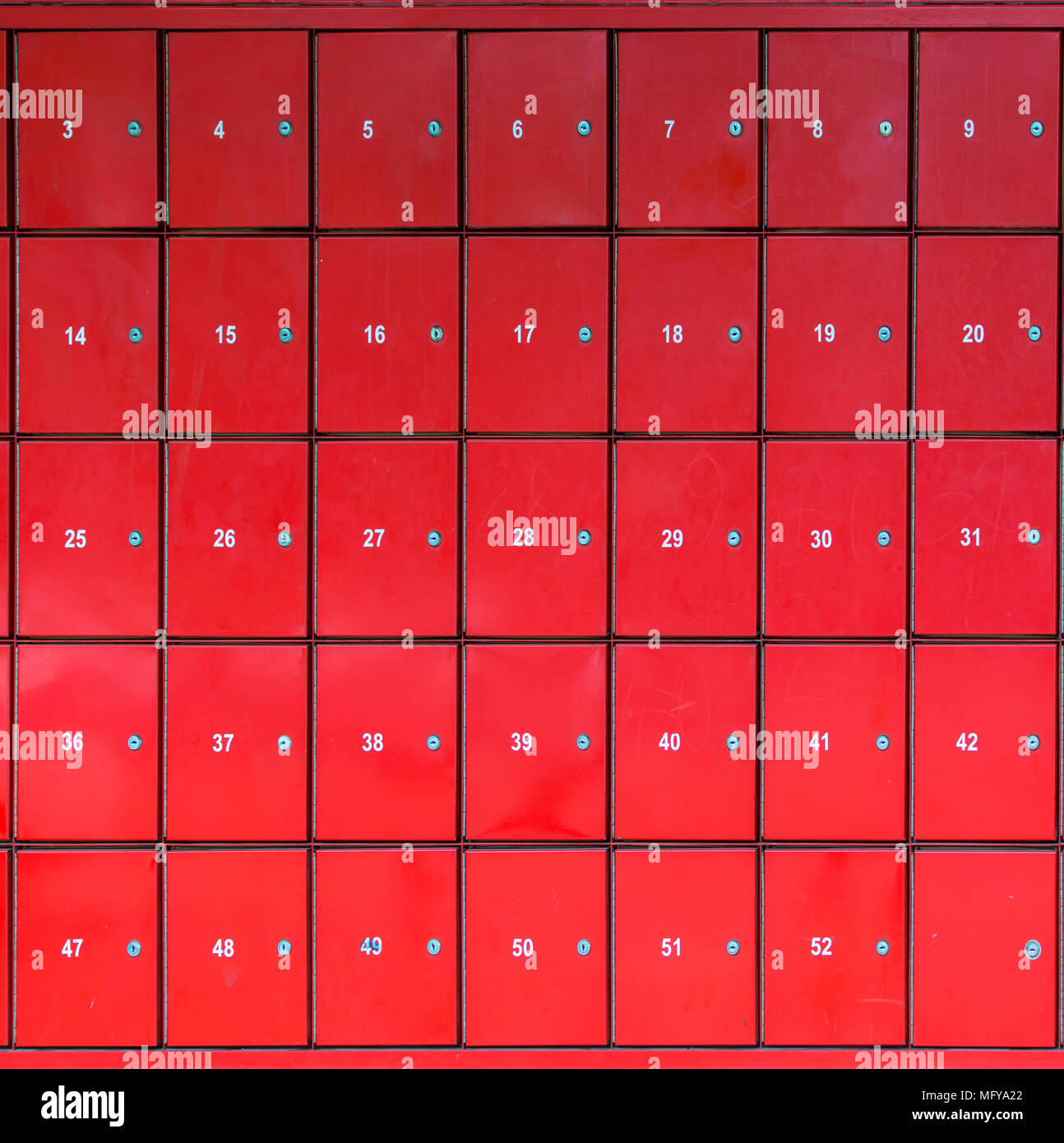 Group of red letterbox in a post office with number range. Mailbox ...