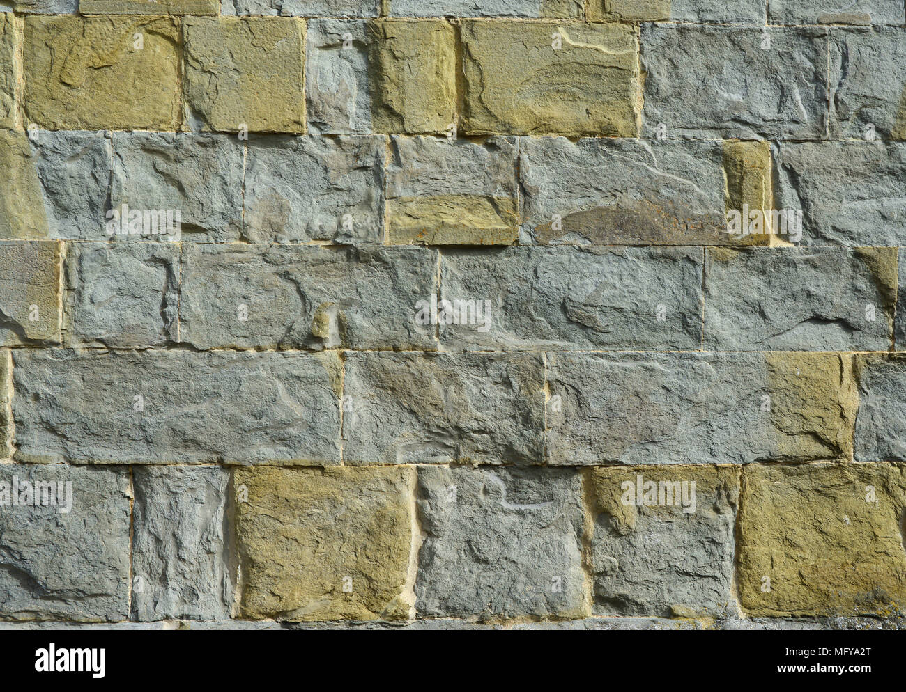Old medieval stone block wall background Stock Photo - Alamy