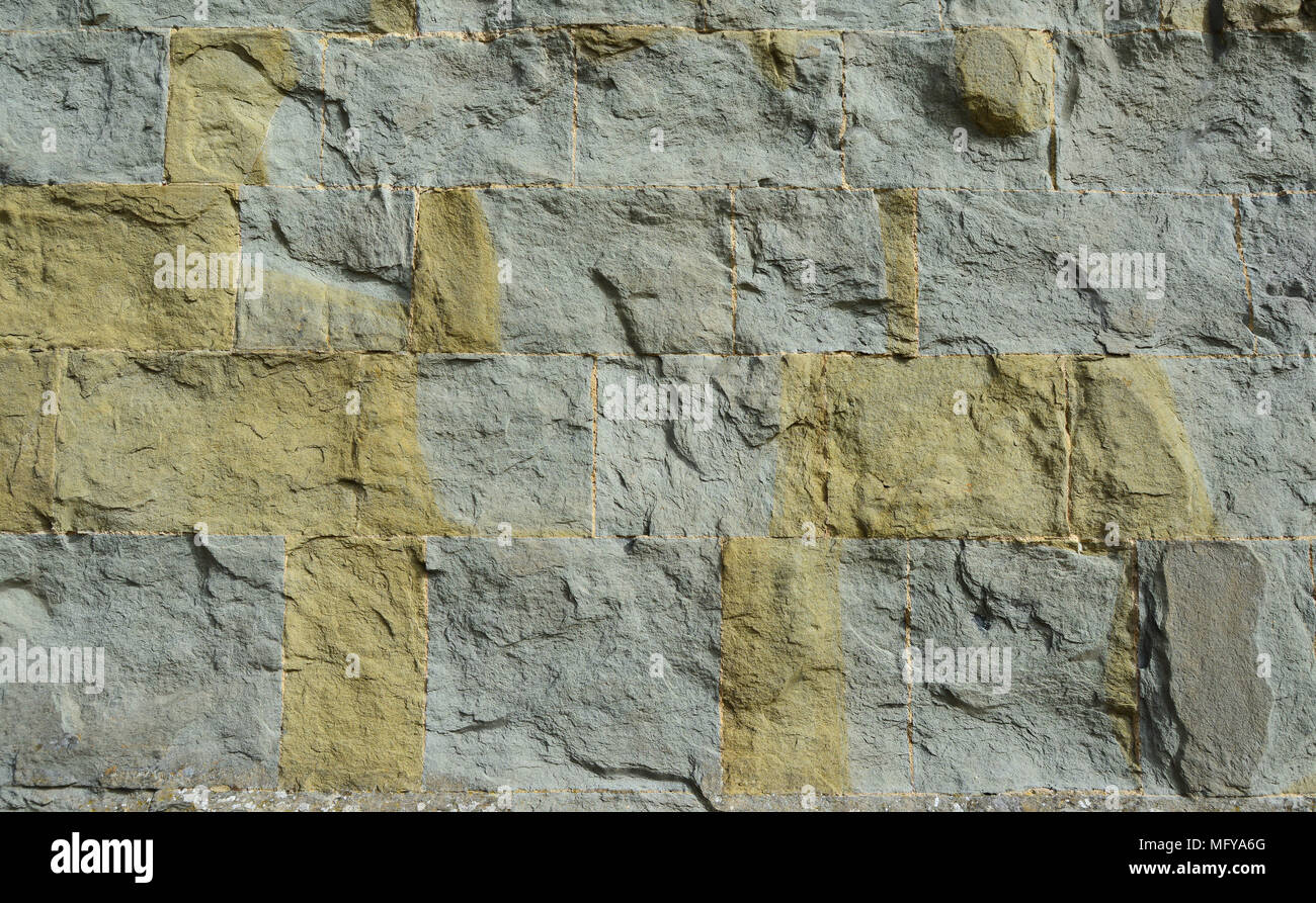 Old medieval stone block wall background Stock Photo - Alamy