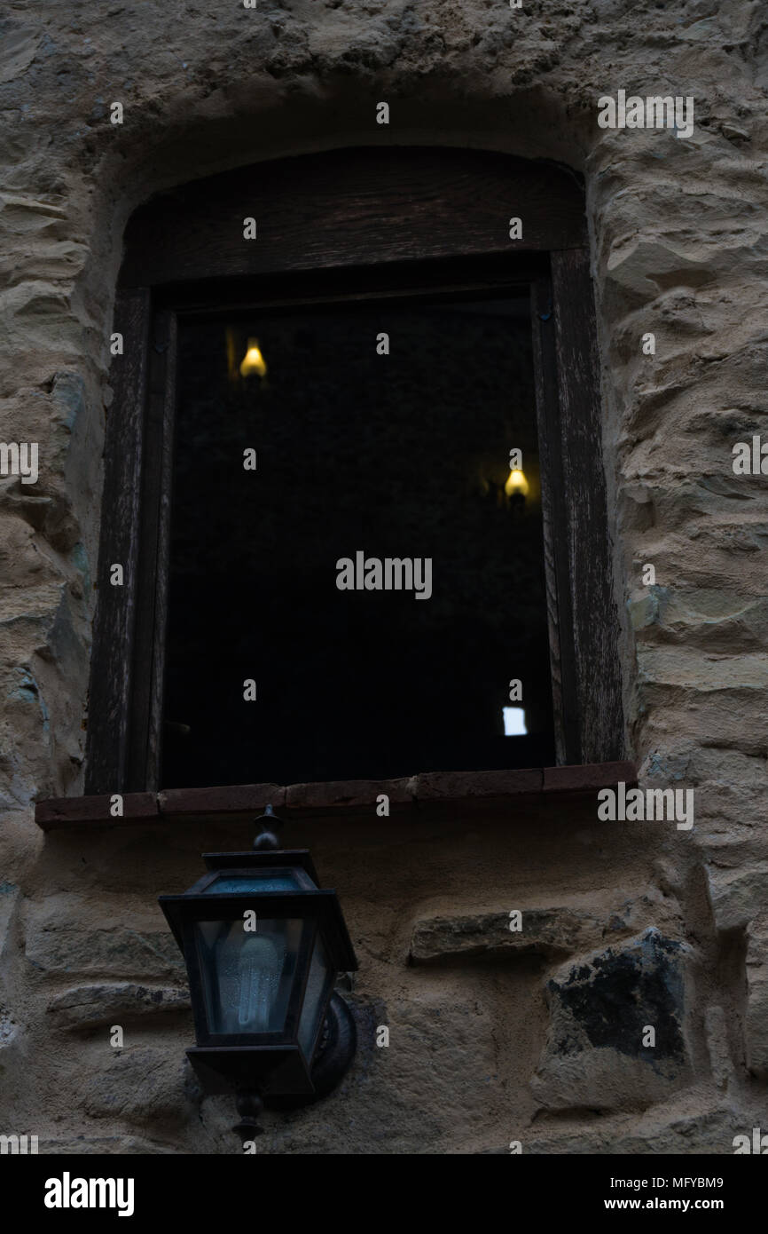 Lights through a fortress window Stock Photo - Alamy