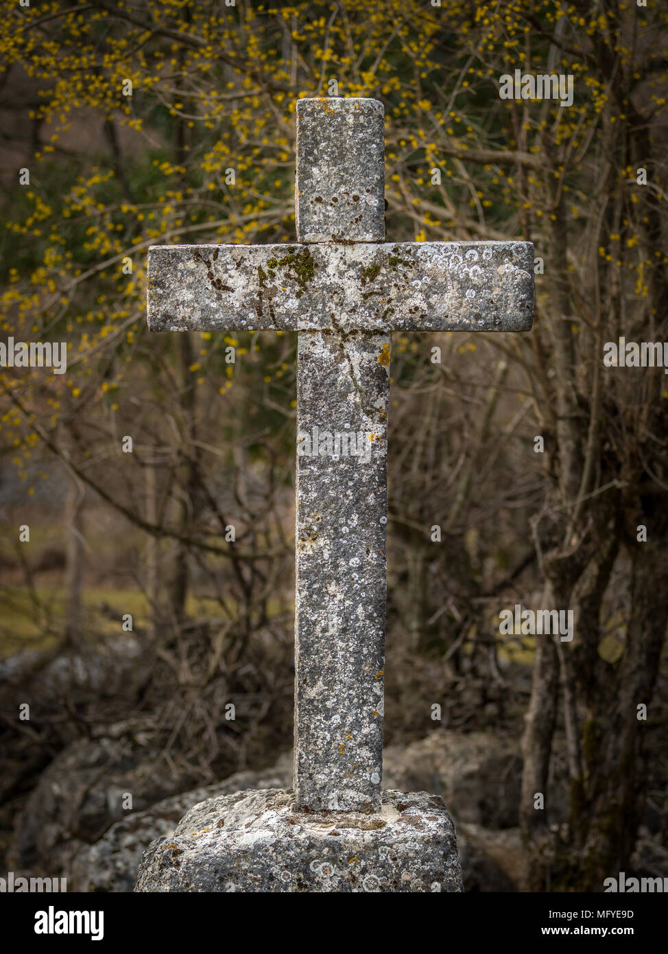Small cross made of stone in a wood in spring, Croatia Stock Photo - Alamy