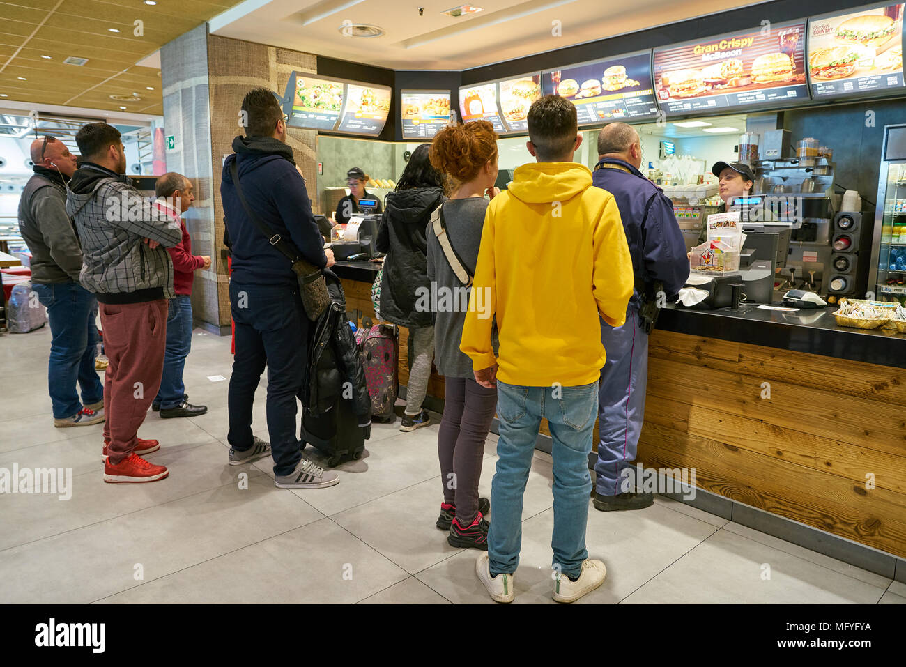 MILAN MALPENSA, ITALY - CIRCA NOVEMBER, 2017: line at a McDonalds ...