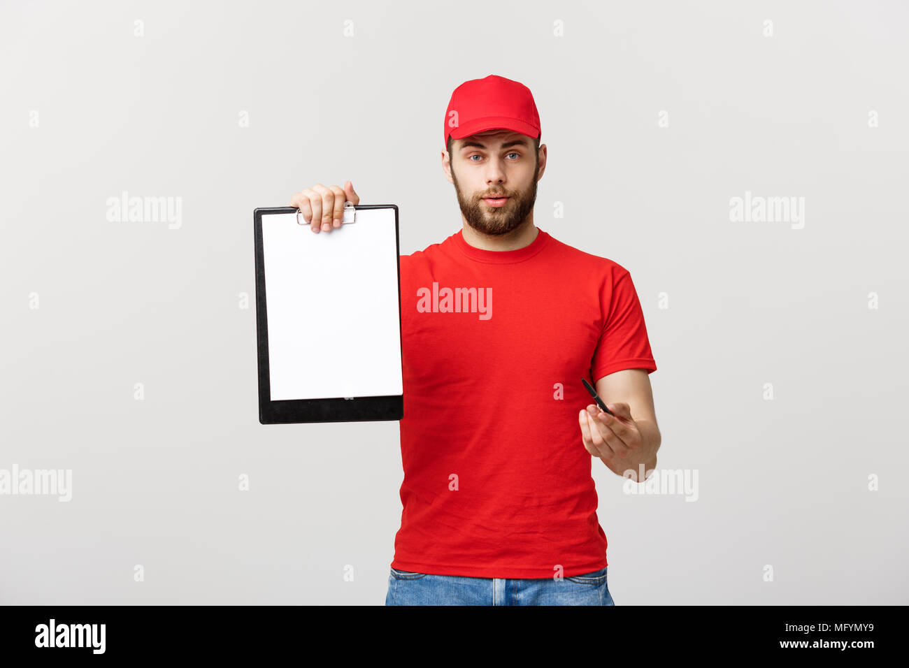 Delivery Concept: Portrait Young caucasian Handsome delivery man or ...