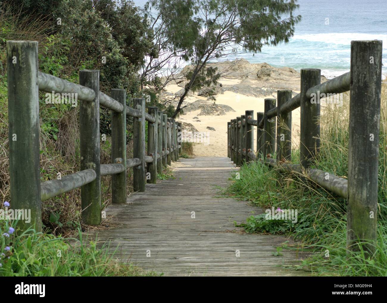 Walking path made of wood at beach in Australia. Ramp for beach access ...