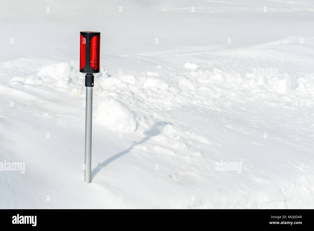 Tall reflector in snow Stock Photo - Alamy