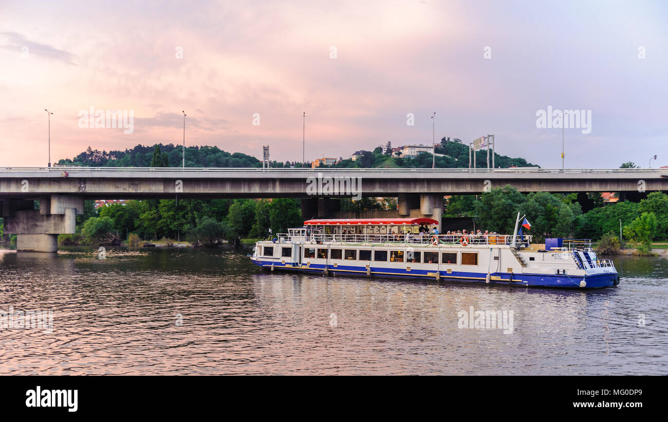 Passenger boat under the bridge Stock Photo - Alamy