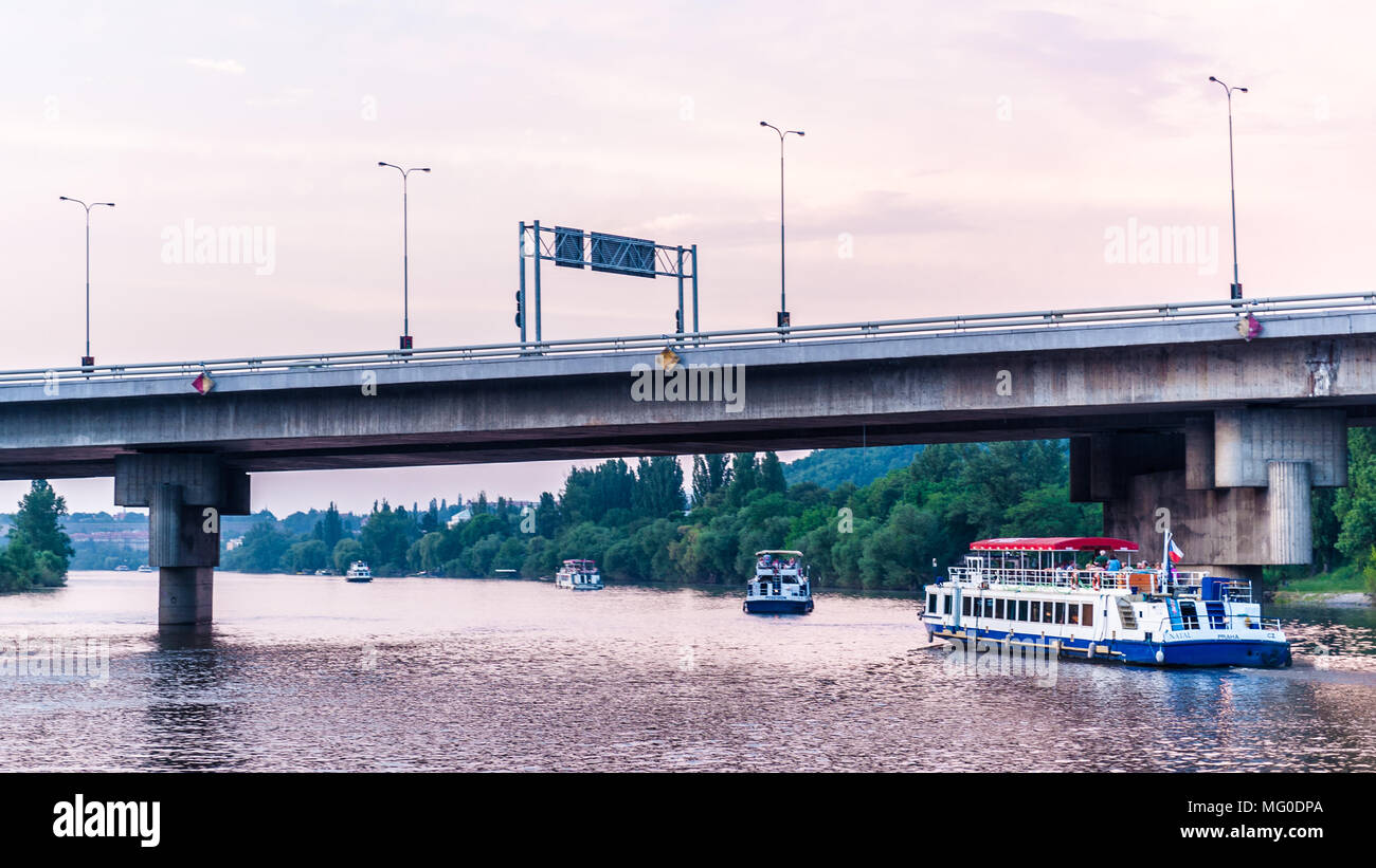 Passenger boat under the bridge Stock Photo - Alamy