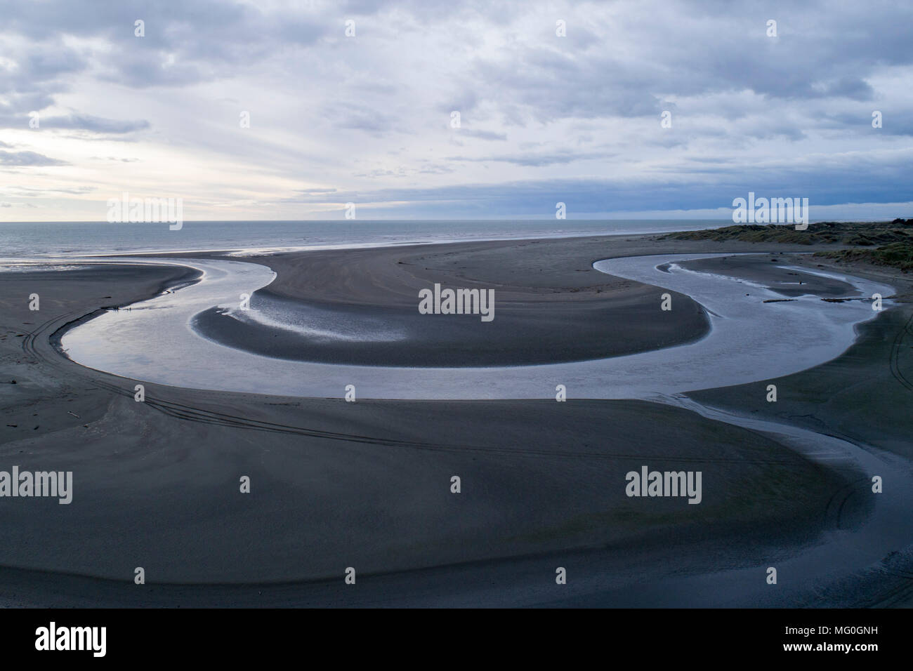 River outlet at beach, Waikawa, Manawatu. New Zealand Stock Photo - Alamy