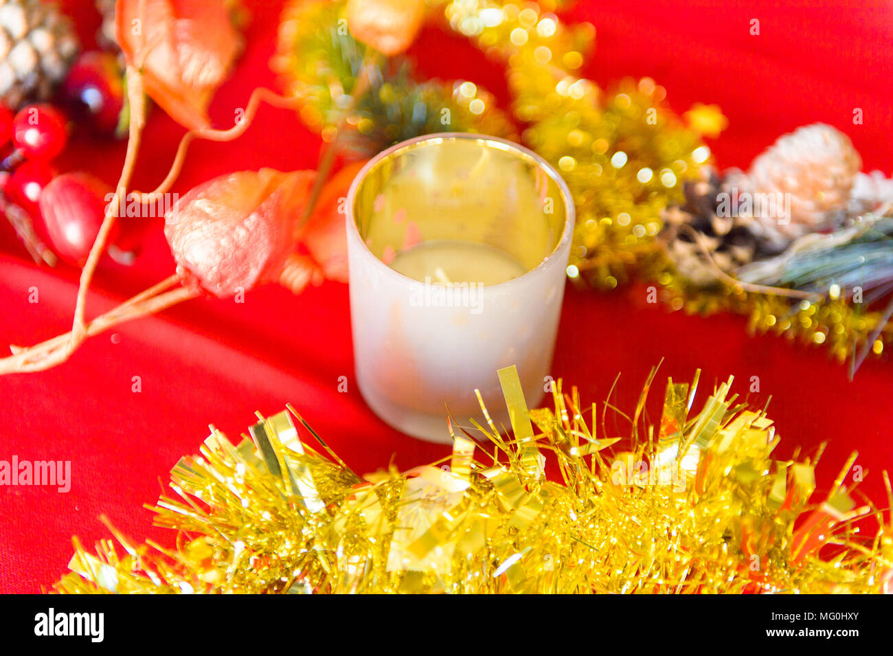 Christmas tree decoration objects on the red tissue Stock Photo - Alamy