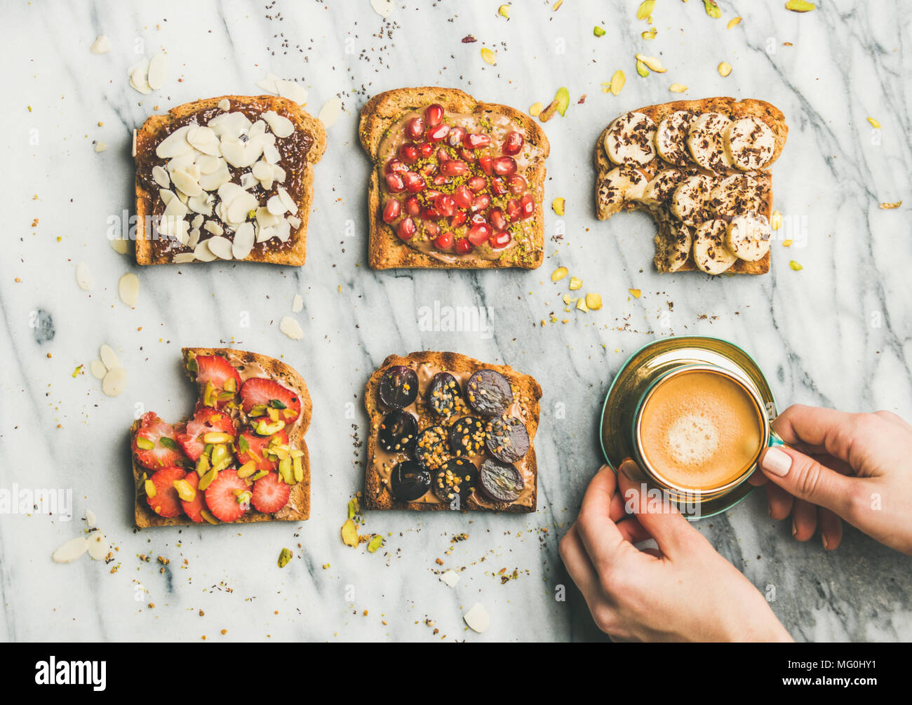 Healthy breakfast with wholegrain toasts , coffee over light marble ...