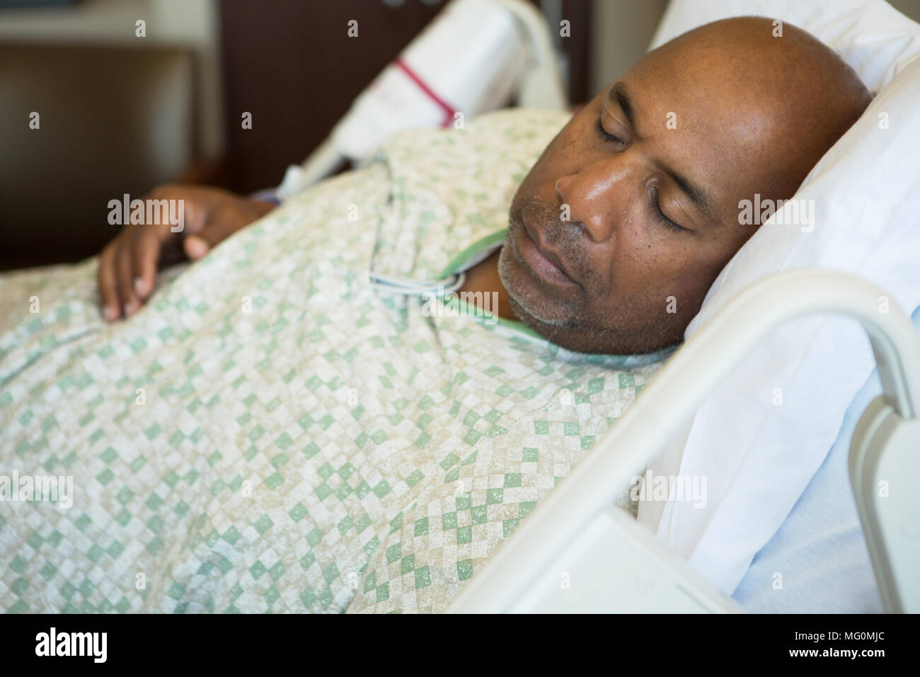 Old Man Hospital Bed Stock Photos & Old Man Hospital Bed Stock Images ...