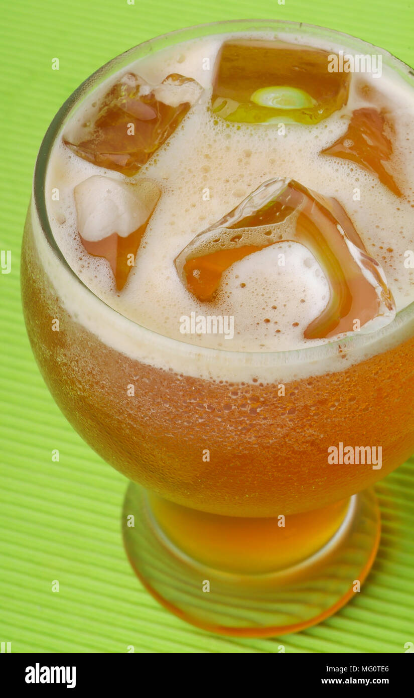 tea ice, iced tea with ice cubes on background Stock Photo - Alamy