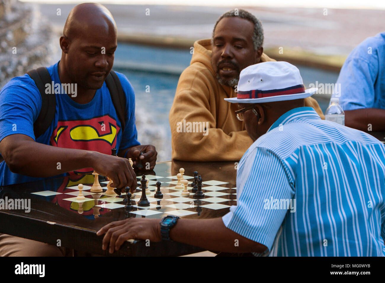African-American men play chess on a community chess table at Woodruff ...
