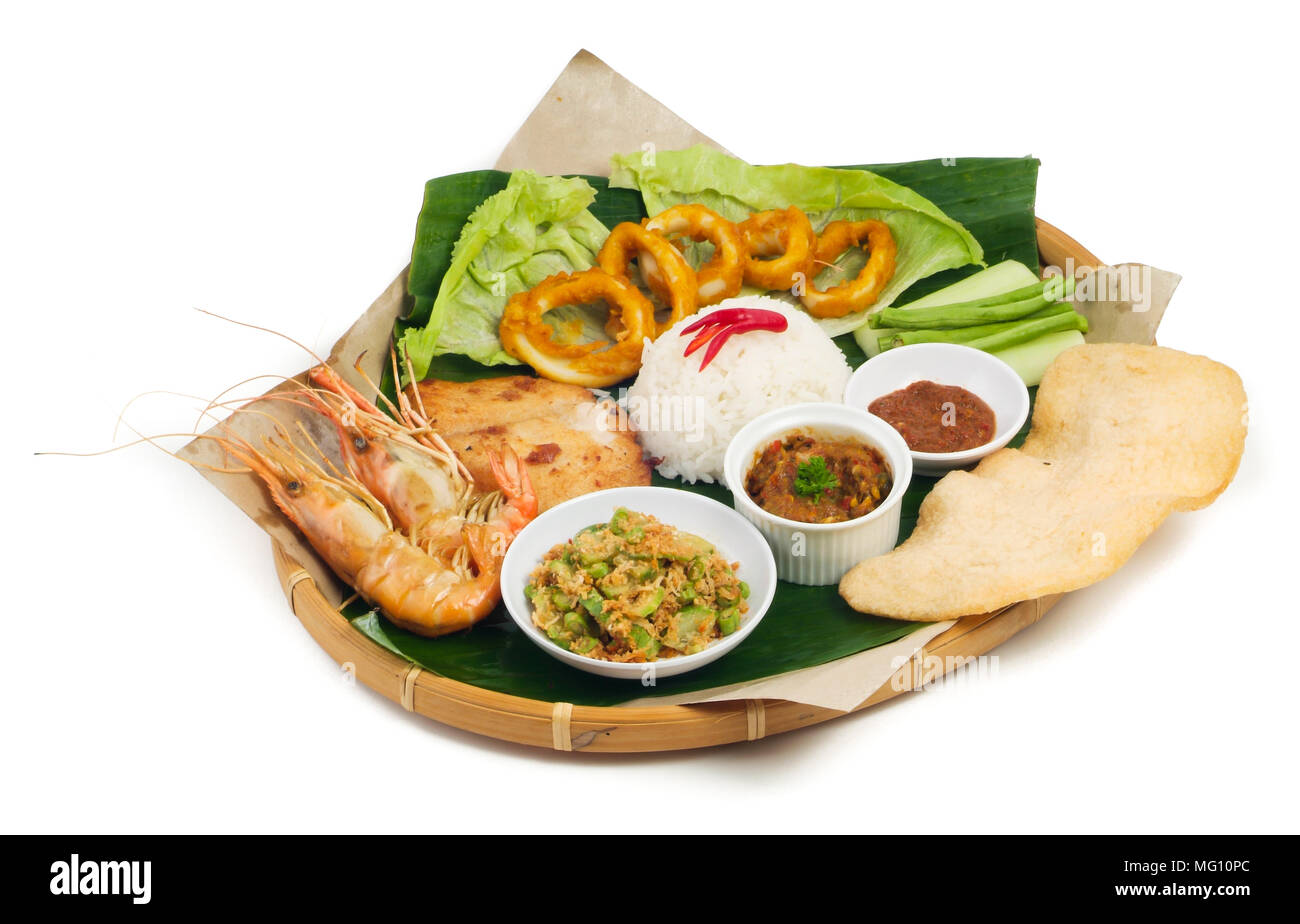 Indonesian traditional food, chicken, fish, vegetables Stock Photo - Alamy