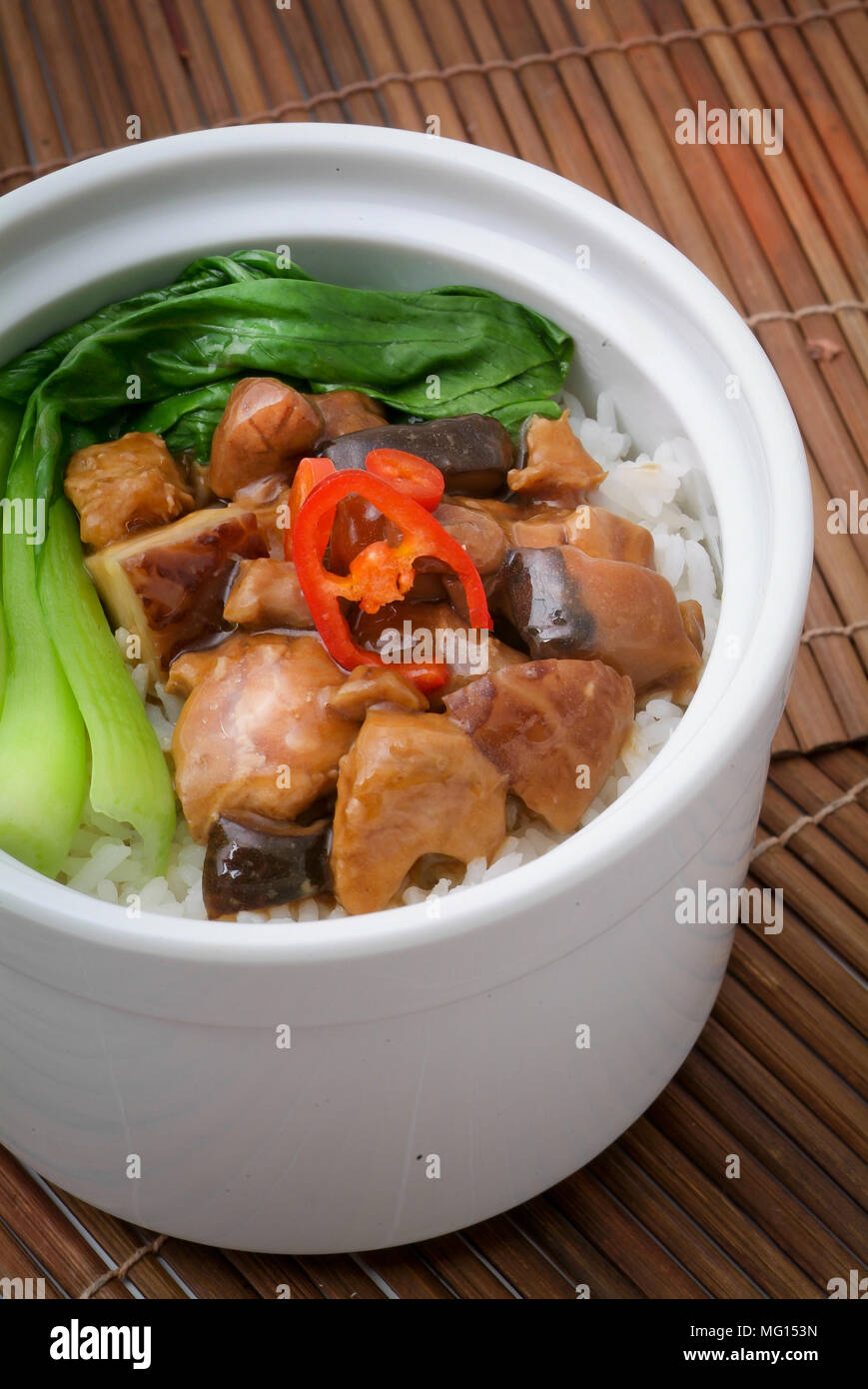 Chicken Mushrooms rice and vegetables in background Stock Photo - Alamy