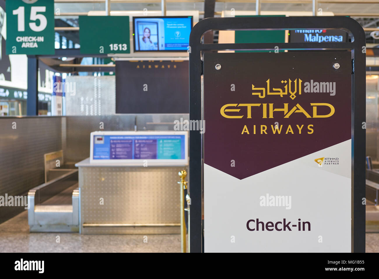 MILAN MALPENSA, ITALY - CIRCA NOVEMBER, 2017: Etihad Airways check-in ...